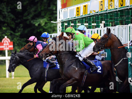 Runners and riders leave the starting gate during the White Oak UK ...