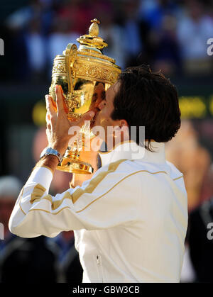 Side view of Swiss tennis player Roger Federer smiling after his match ...