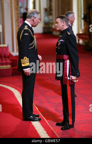 Captain Neil England is made an MBE by the Prince of Wales at ...