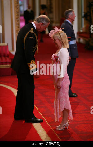 Mrs Ann Munro is made an MBE by the Prince of Wales at Buckingham ...
