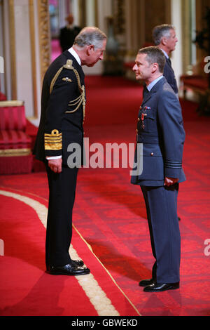 Wing Commander Anthony Keeling is made an MBE by the Prince of Wales at ...