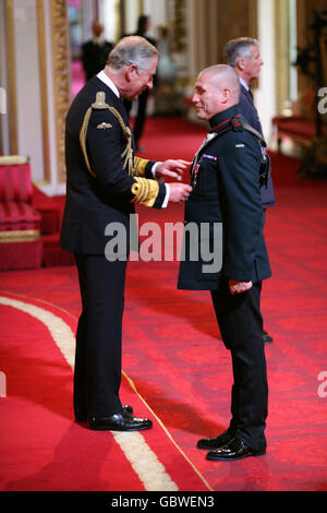 Captain Dean Murch is made an MBE by the Prince of Wales at Buckingham ...
