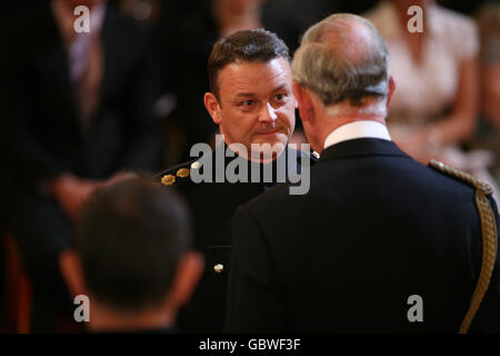 Captain Neil England is made an MBE by the Prince of Wales at ...