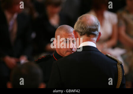 Captain Dean Murch is made an MBE by the Prince of Wales at Buckingham ...