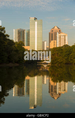 Skyline and reflections of midtown Atlanta, Georgia in Lake Meer from ...