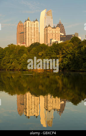 Skyline and reflections of midtown Atlanta, Georgia in Lake Meer from ...