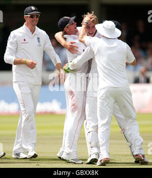 England's players celebrate the dismissal of Ricky Ponting from ...