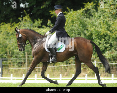 Ruth Edge riding Mayhem III competes in the Dressage competition during ...