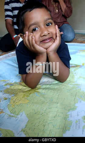 Three-year-old Mathew Kappen with his parents Jim and Manju from Theale ...