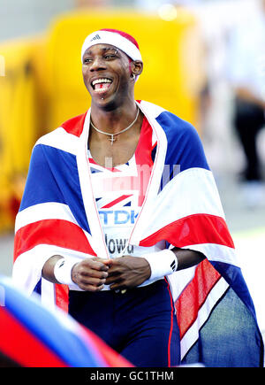 Britain's Phillips Idowu celebrates after taking the silver medal in ...