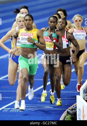 South African athlete Caster Semenya (C) and her coach Michael Seme (R ...