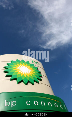 The BP logo at a petrol station with the BP Connect sign reflecting on ...