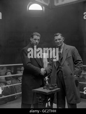 British light heavyweight boxer Len Harvey, left, shakes hands with ...