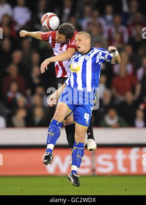 Sheffield Wednesday's Darren Purse (right) stands angrily over Crystal ...