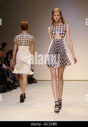 Model Christopher G walking on the runway during the Balenciaga Ready ...