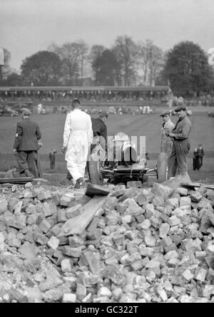 Aubrey Esson-Scott with his Bugatti car after crashing in the ...