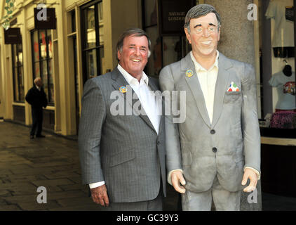 Sir Terry Wogan is presented with a life-size cake replica of himself ...