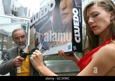 Models playing the roles of Cluedo characters Miss Scarlet and Colonel ...