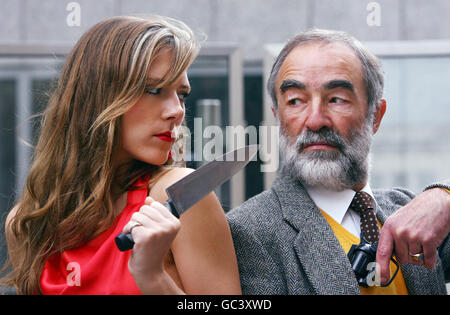 Models playing the roles of Cluedo characters Miss Scarlet and Colonel ...