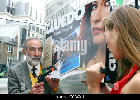 Models playing the roles of Cluedo characters Miss Scarlet and Colonel ...