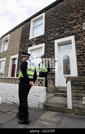 Police outside a property raided by counter terrorism officers on Manor ...