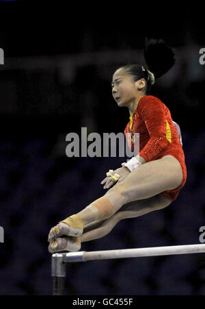 China's Linlin Deng performs her uneven bars routine during the ...