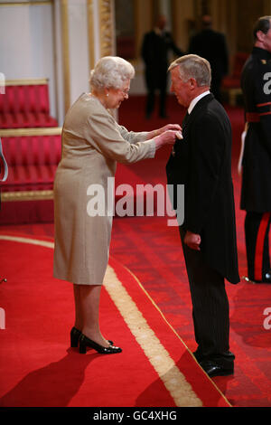 Mr. Geoffrey Farr from Luton is made an MBE by The Queen at Buckingham ...