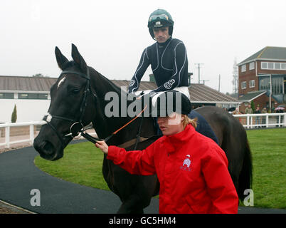 Denman ridden by Ruby Walsh goes to gallop the course at Exeter ...