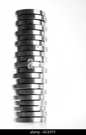 Stacked column of flat steel flanges isolated on white Stock Photo - Alamy