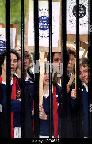 Nurses from the Royal Marsden Hospital model uniforms dating from three ...