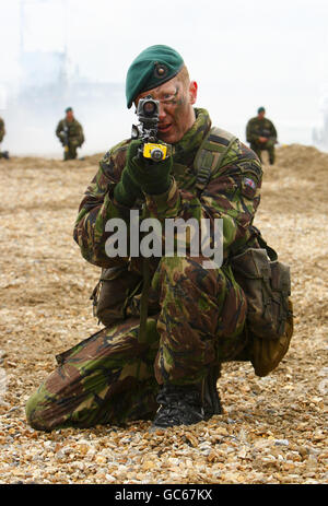 42 Commando Royal Marines storm the beach at Browndown near Lee on ...