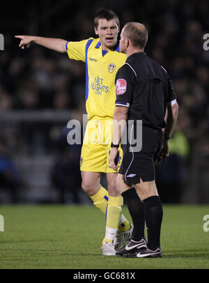 Leeds United players argue with referee, Tim Robinson, during the Sky ...