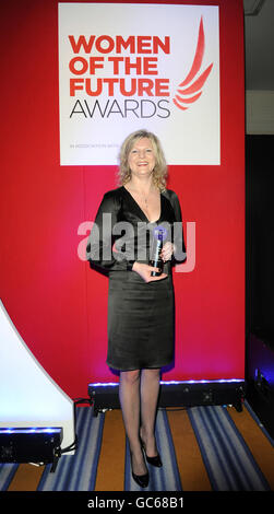 Annie Graham, 31, from Ernst and Young, holds The Professions Woman of ...