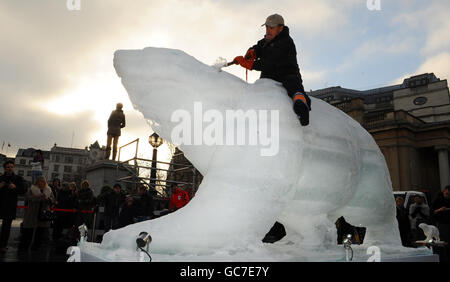 Mark Coreth on top of his Ice Bear Project sculpture, Trafalgar Square ...