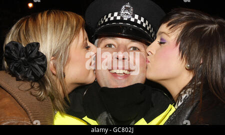 Revellers Naomi Gallagher (left) and Melissa Drummond enjoy the ...