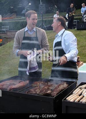 Prince William cooking a barbeque with the New Zealand Prime Minister ...