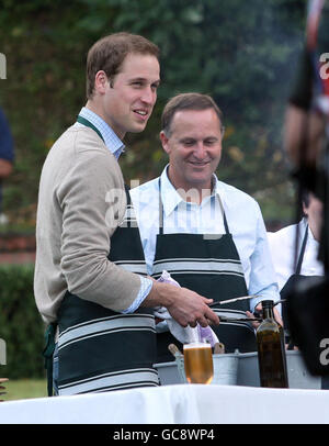 Prince William cooking a barbeque with the New Zealand Prime Minister ...
