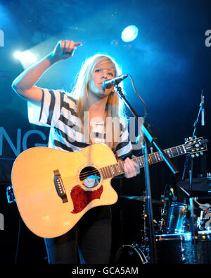 Singer Ellie Goulding performs at half time of an NFL football game ...
