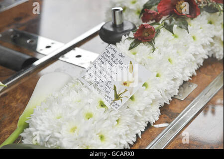 A message on a floral tribute at the funeral of Captain Daniel Read, 31 ...