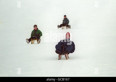Prince Charles on a sledge with Prince Harry while on holiday in ...