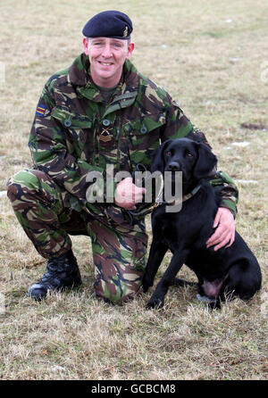 Dog Handler From the British Army Prepares to Take His Dog in Front of ...