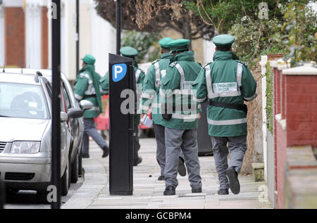 Five Civil Enforcement Officers patrol a street in Clapham, London ...