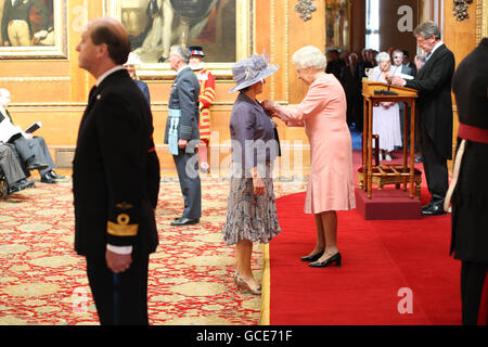 Mrs Gillian Coffey from Marlow is made an OBE by The Queen at Windsor ...