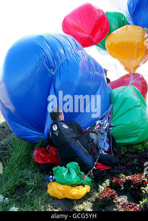 Jonathan Trappe with his balloon after landing on farmland in Moeres ...