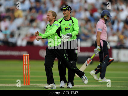 Gareth Batty of Surrey celebrates taking the wicket of Ashar Zaidi ...