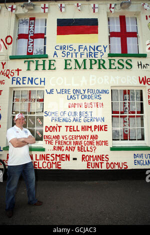 Dave Utting, Landlord of the Empress pub in Cambridge, stands in front ...