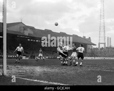 Ronald Tindall, the Chelsea centre-forward Towers above Kenneth Rea the ...