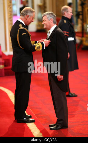 Mr. David Anderson is made a Member of the Royal Victorian Order by the ...