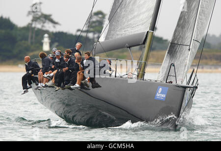 Sir Peter Ogden at the helm of his new maxi yacht Jethou racing in the ...