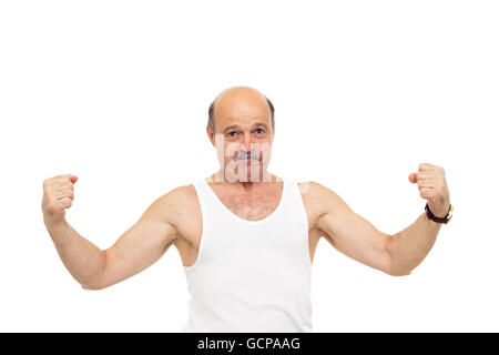 Elderly man shows muscles. keep fit by exercise Stock Photo - Alamy